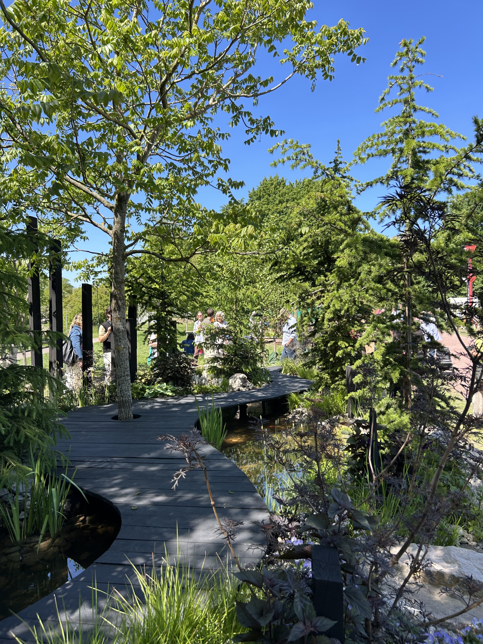 Urinals amongst flower beds — Malmö Garden Show 2026 - Sanitation 360